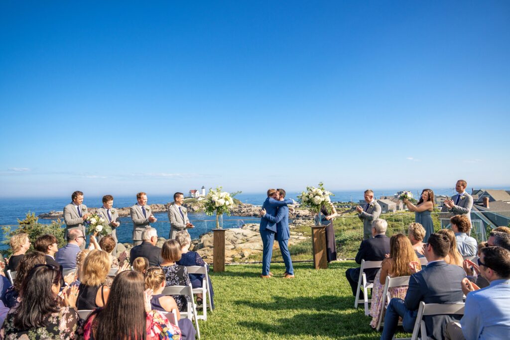 The ViewPoint Hotel Wedding in York, ME - Geraniums Red, Delphiniums Blue